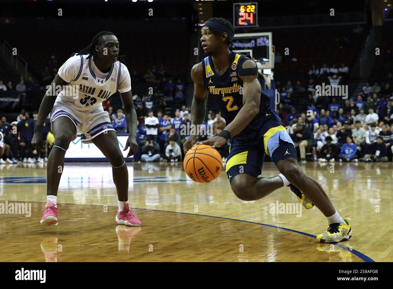 Marquette guard Chase Ross (2) dribbles the ball against Seton Hall ...