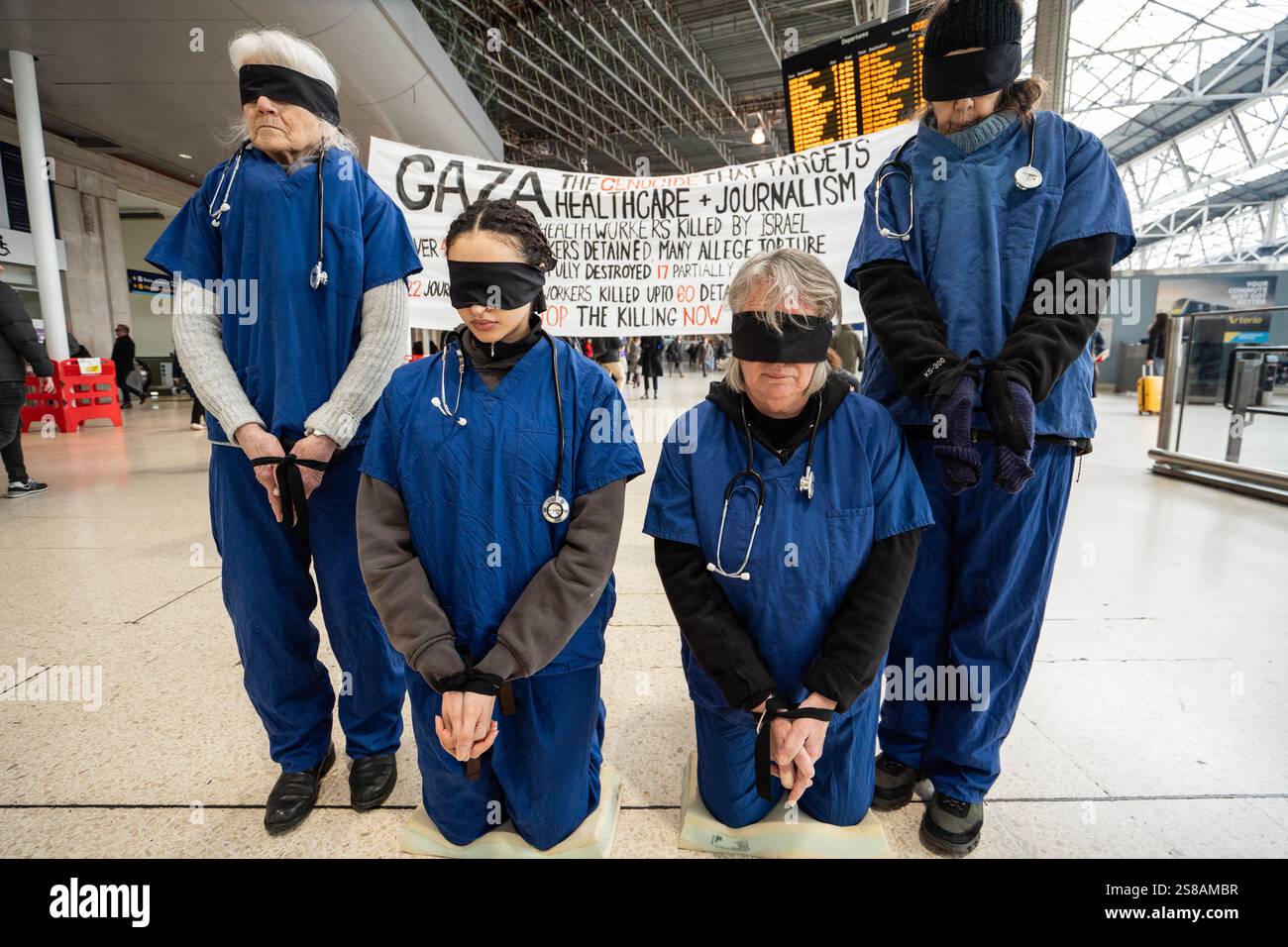 London, UK. 21st Jan, 2025. Four pro-Palestinian campaigners dressed as ...