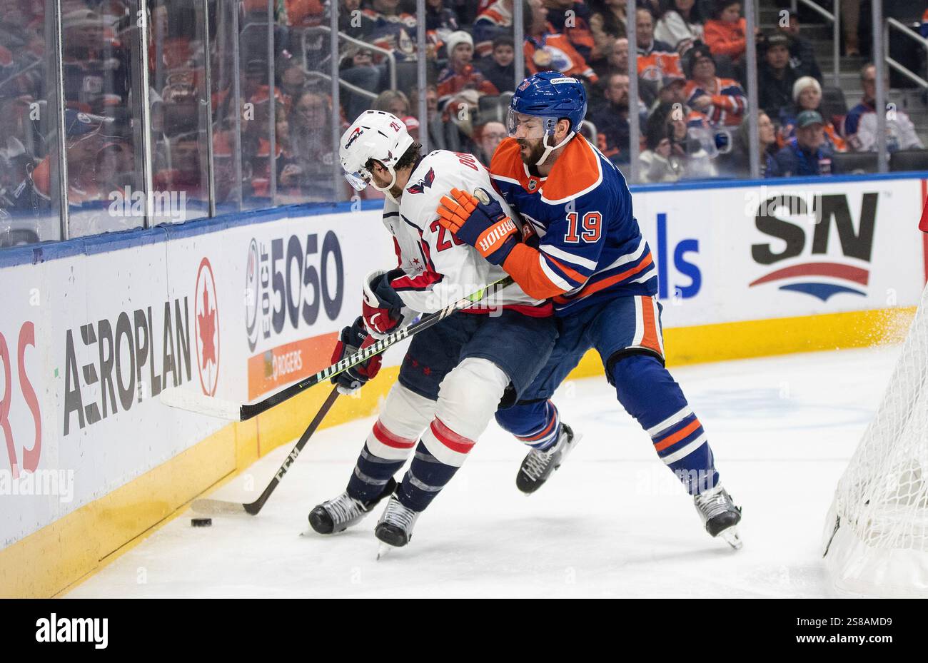 Washington Capitals' Nic Dowd and Edmonton Oilers' Adam Henrique (19 ...