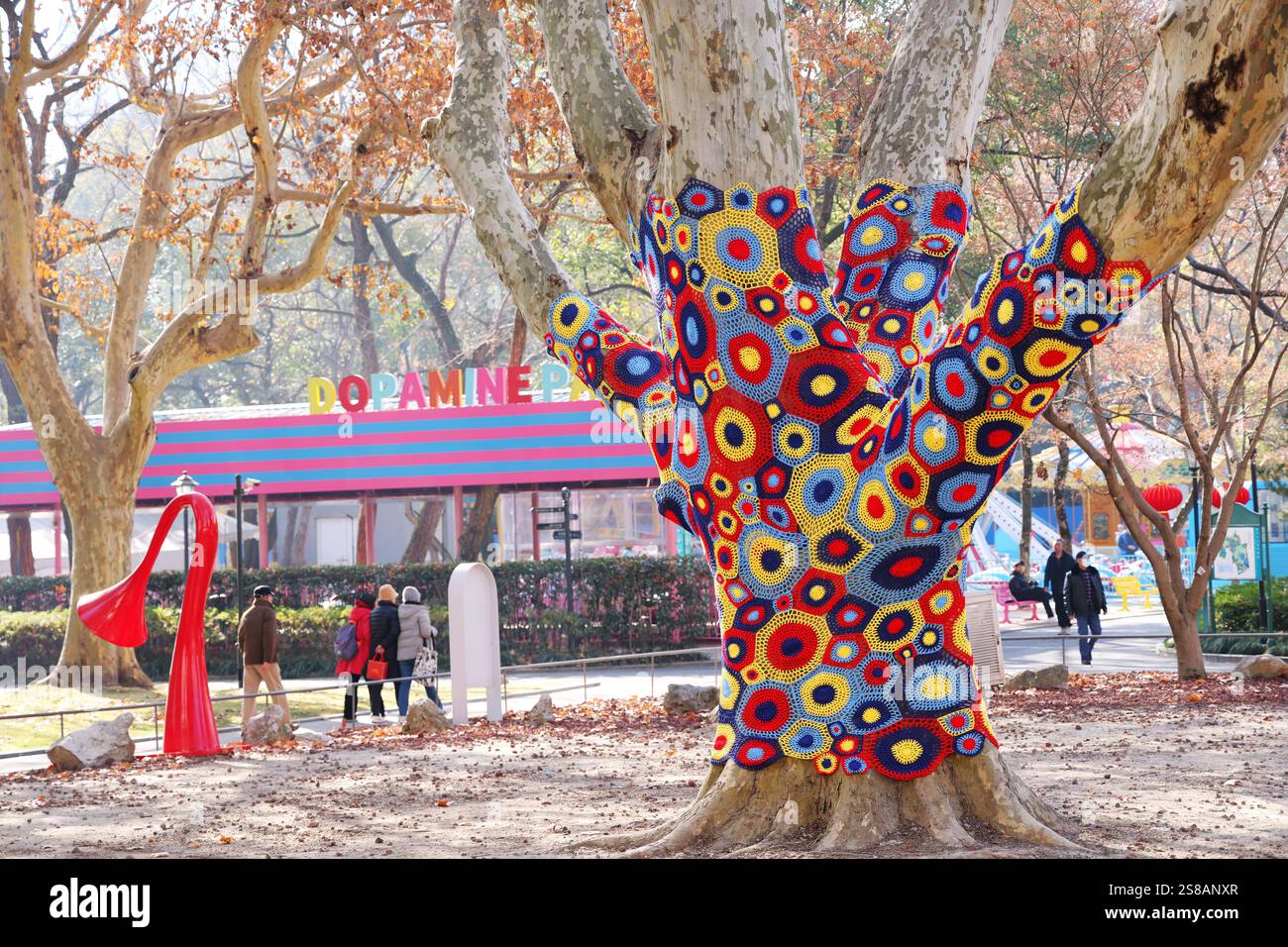 An ancient sycamore tree at Zhongshan Park is put on brightly colored ...