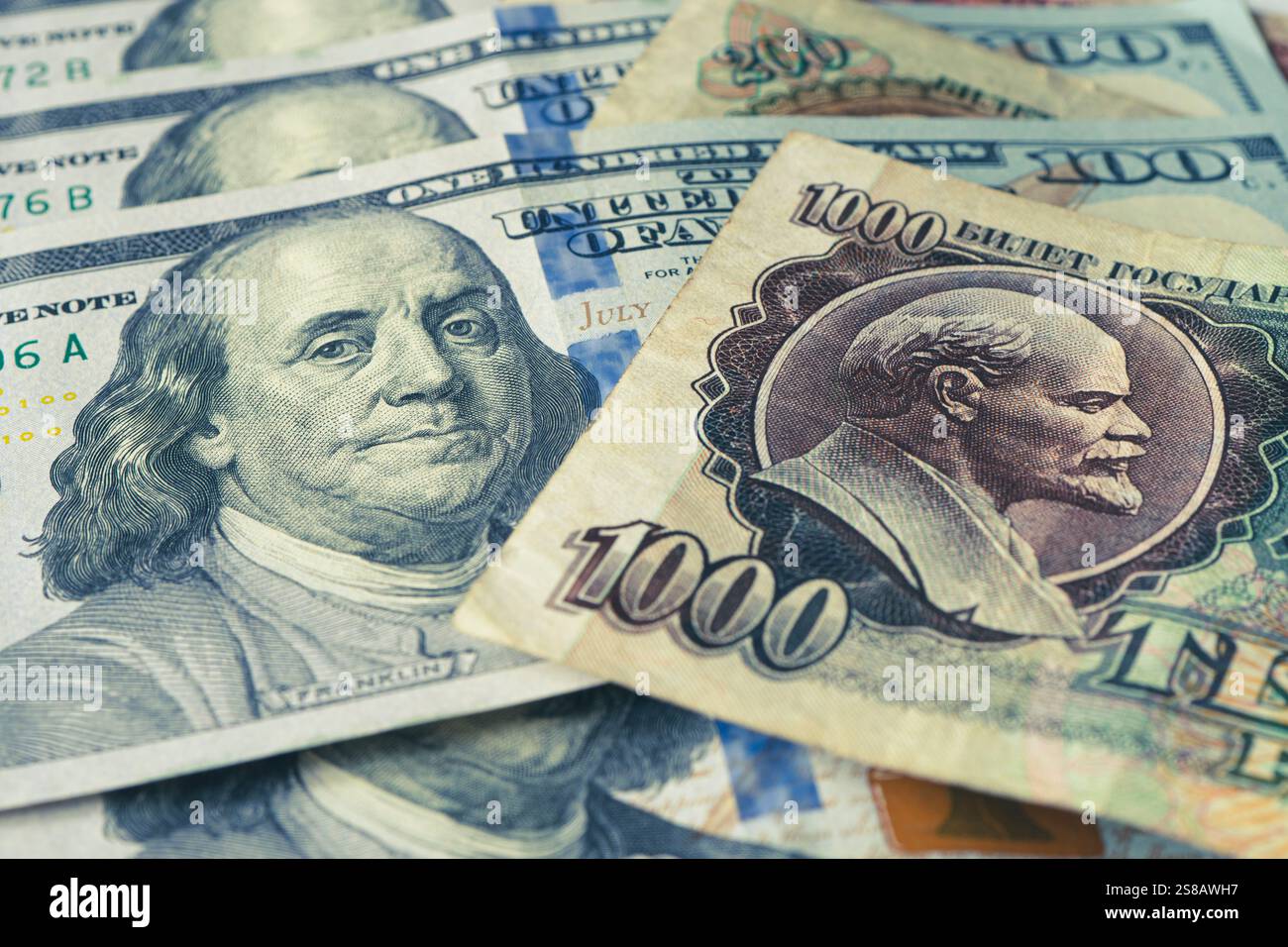 The Russian Soviet ruble and 100 of American dollars. confrontation ...