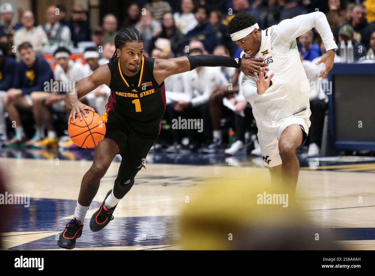 Arizona State guard Alston Mason (1) protects the ball from West ...