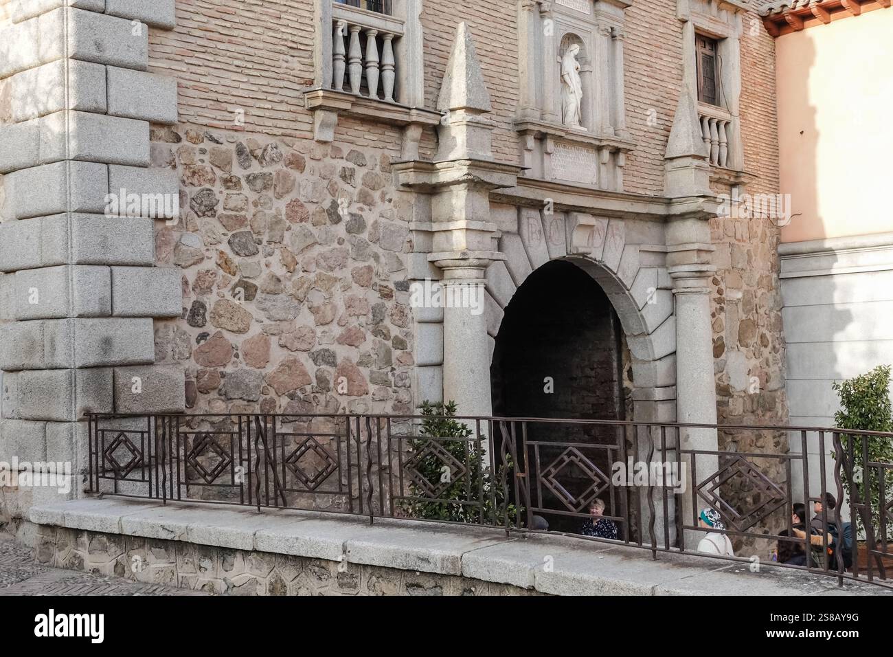 Description: Historic stone gate with four towers, medieval arch ...
