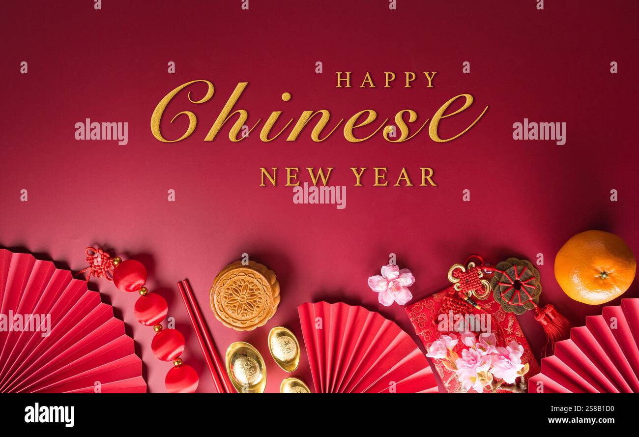 Chinese new year decorations made from red packet, orange and gold ...