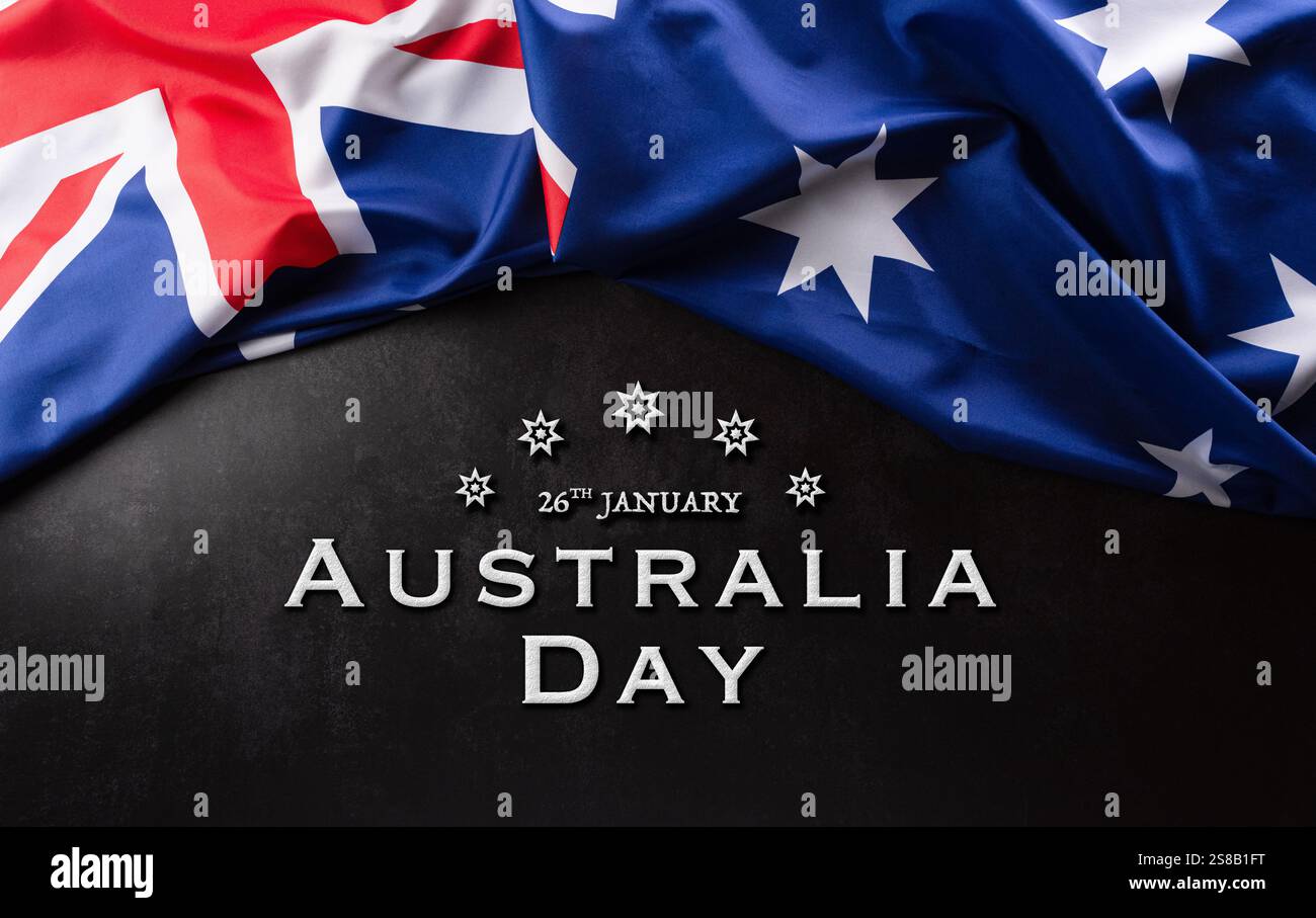 Happy Australia day concept. Australian flag against dark stone ...