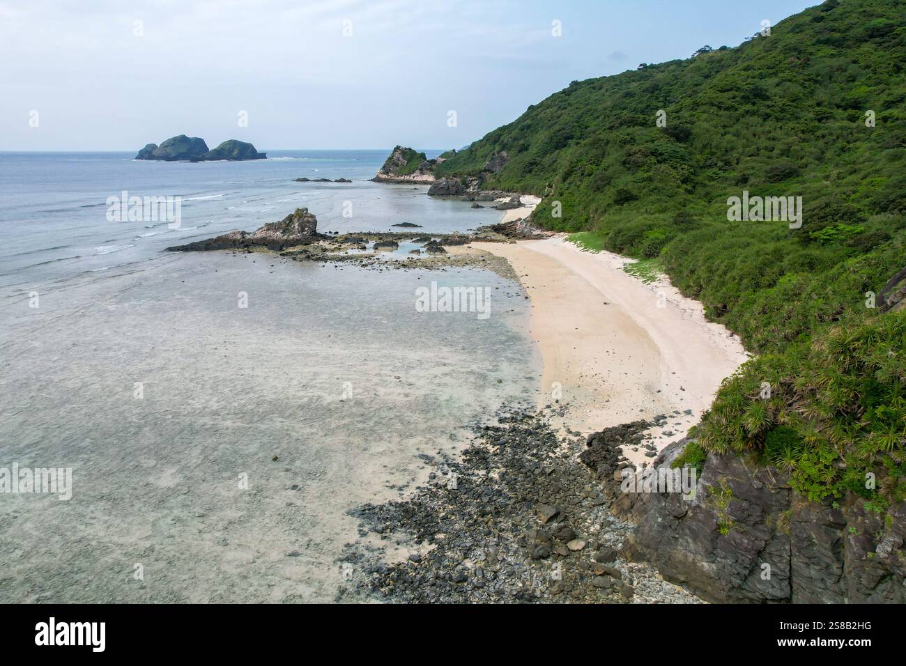 Photographing the spring seaside of Aka Island, Zamami Village, Okinawa Prefecture, Japan with a ...