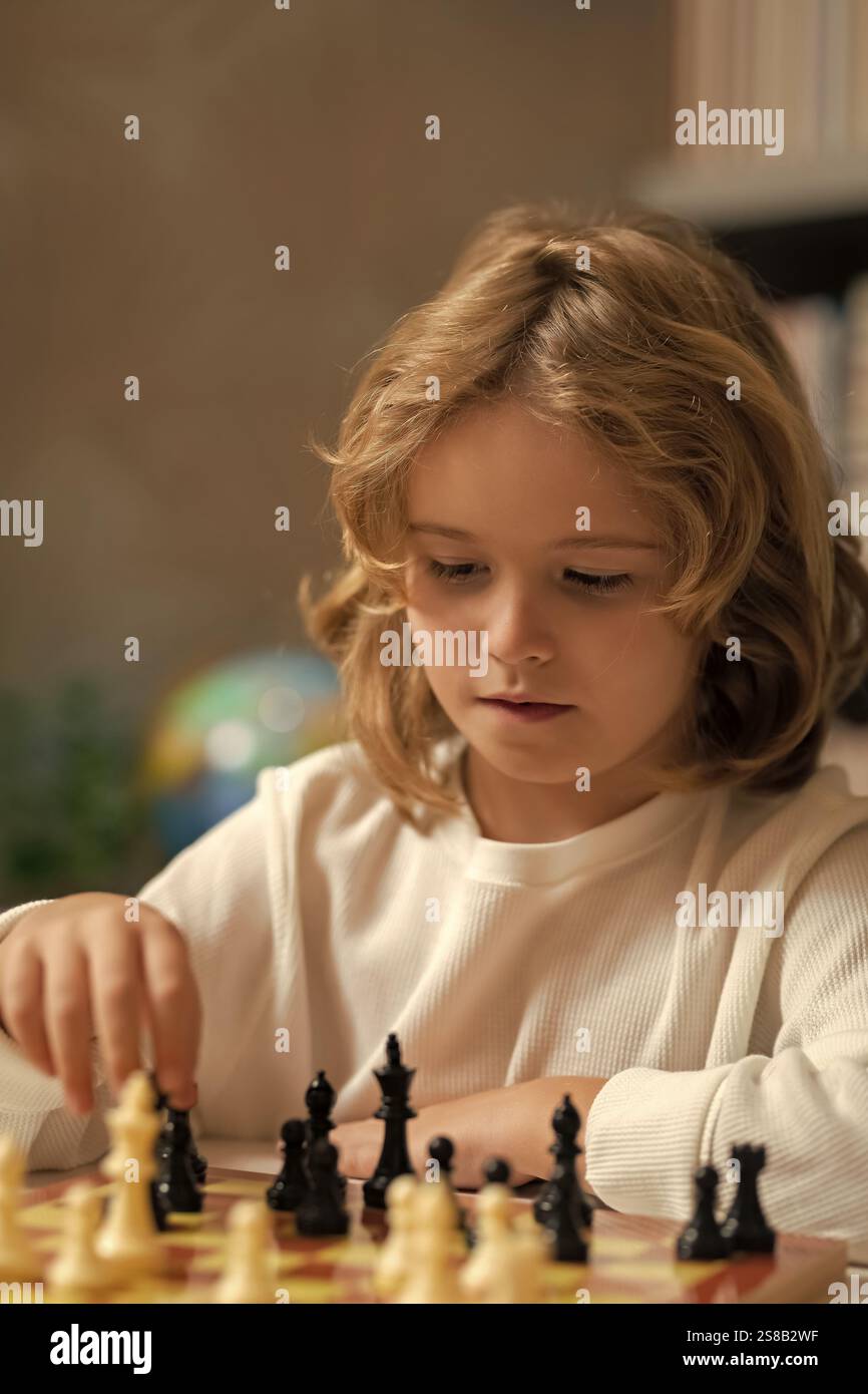 Chess school. Child think or plan about chess game in classroom ...