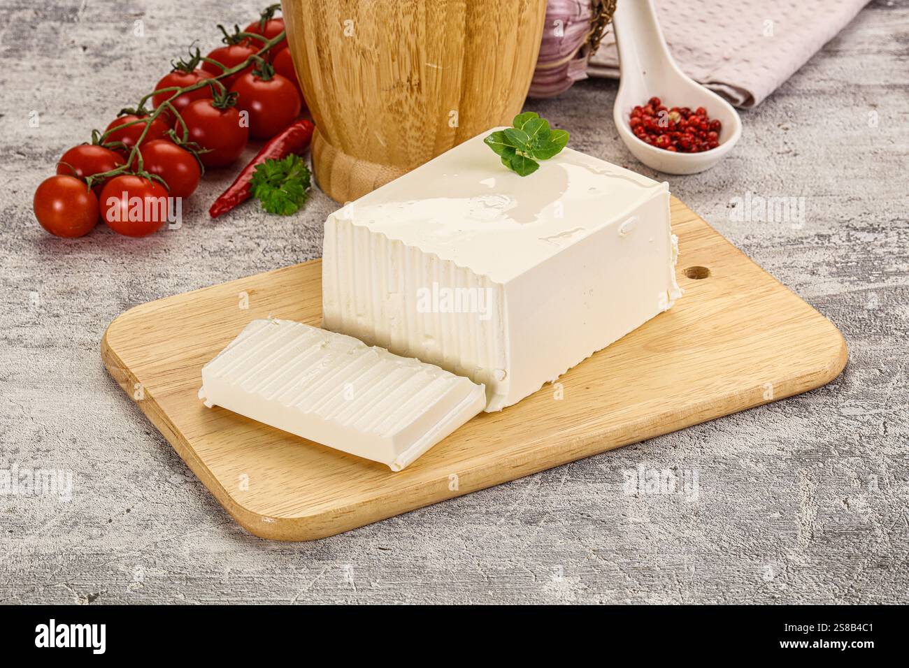 Soft Feta cheese piece with cut snack Stock Photo - Alamy