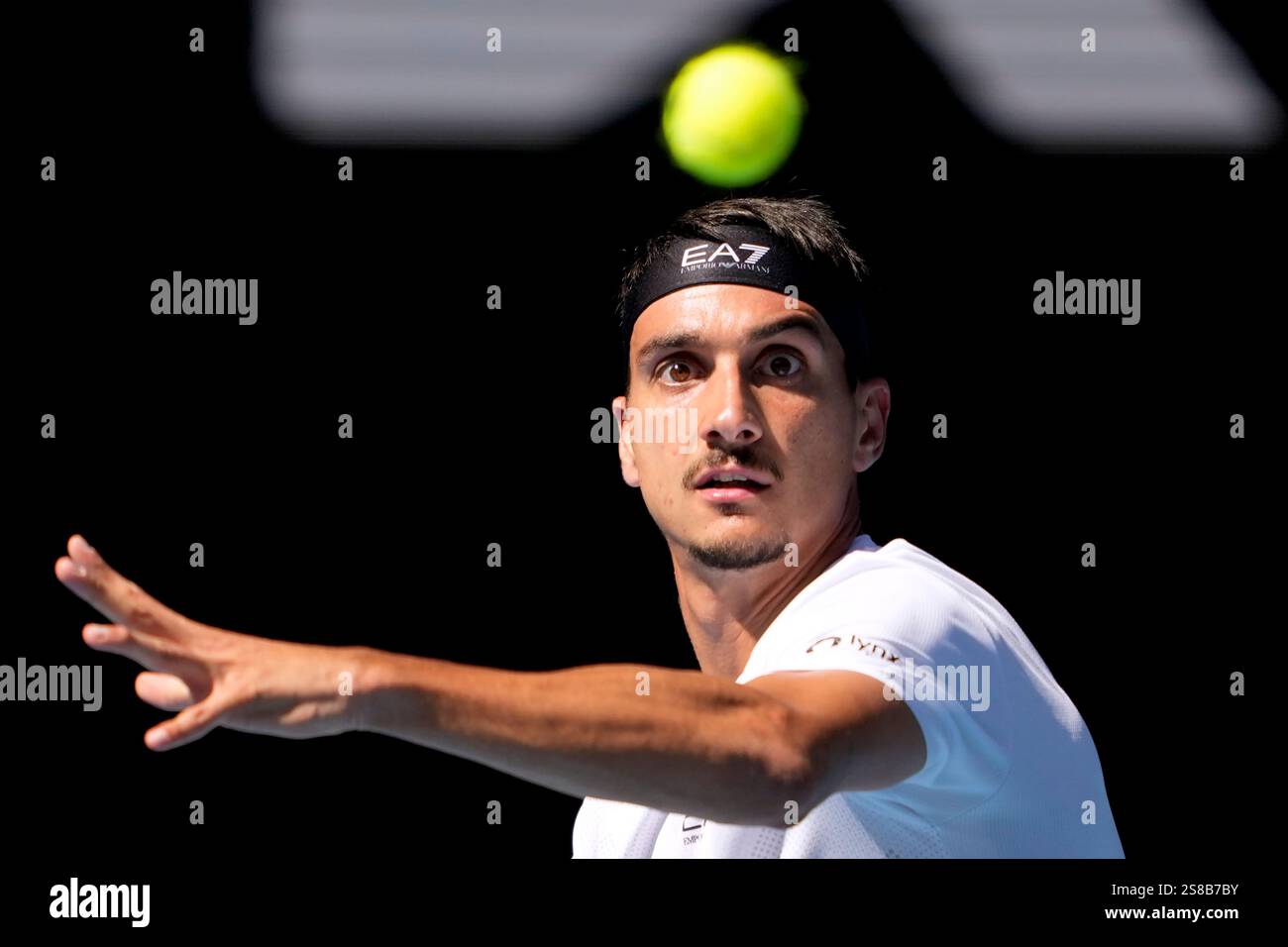 Lorenzo Sonego of Italy plays a forehand return to Ben Shelton of the U.S. during their ...