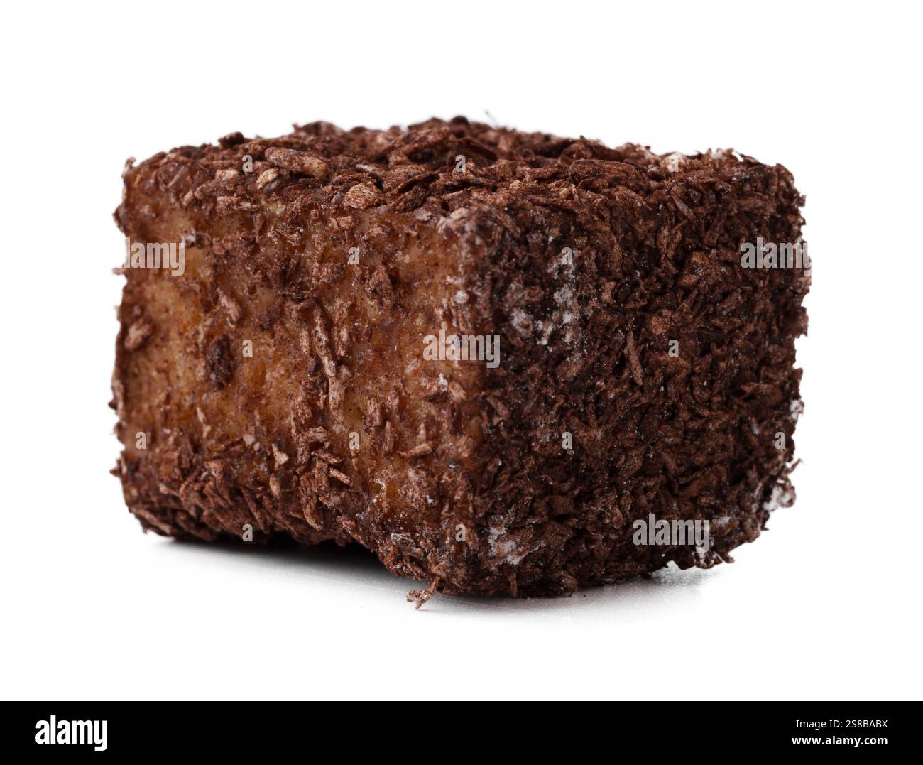 Dessicated coconut coated chocolate treat displayed on a white ...