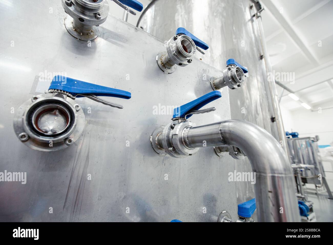 Industrial piping system with blue valves showcased in a modern ...
