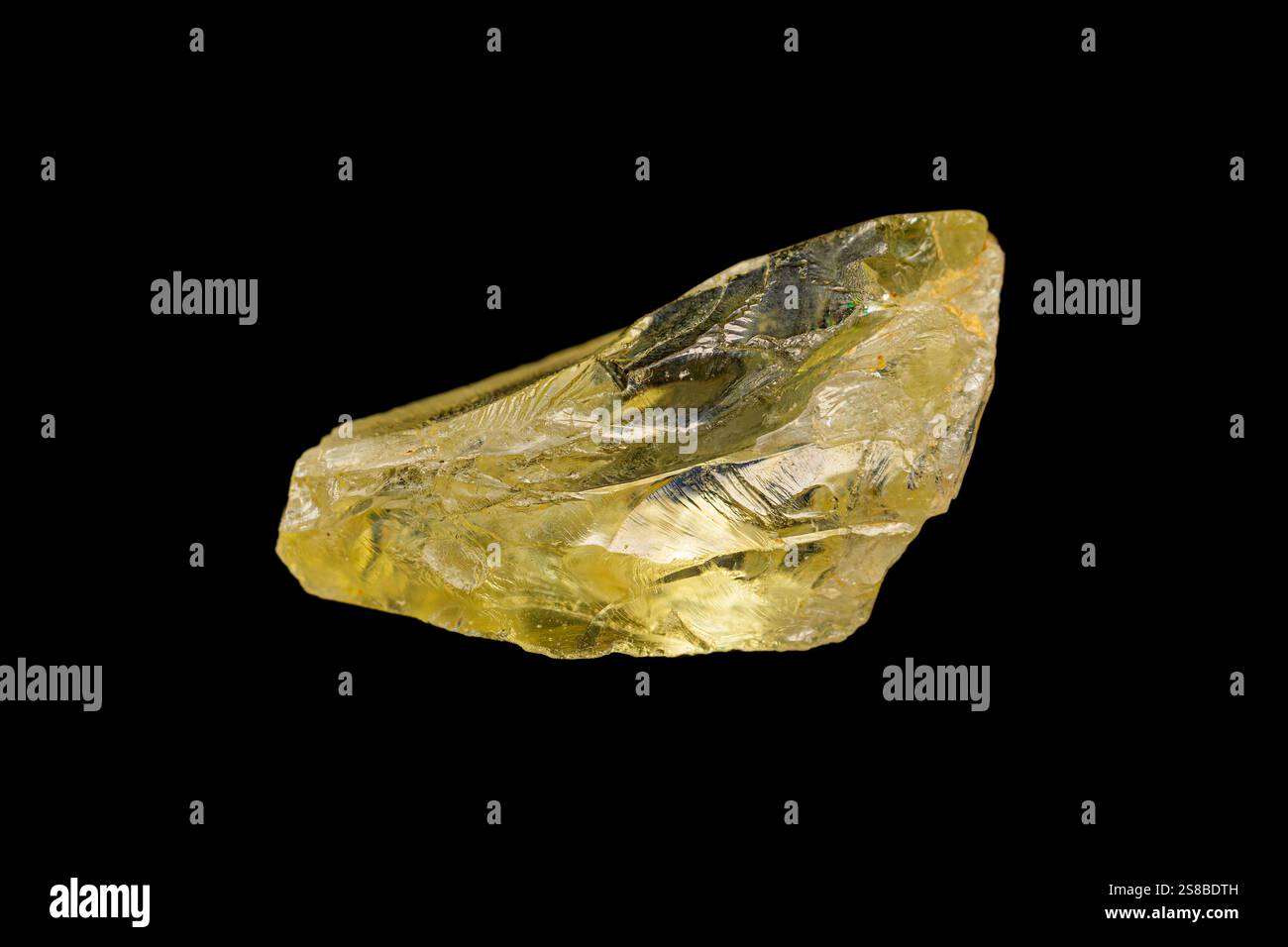Natural rough transparent orthoclase (jewelry grade) on dark background ...