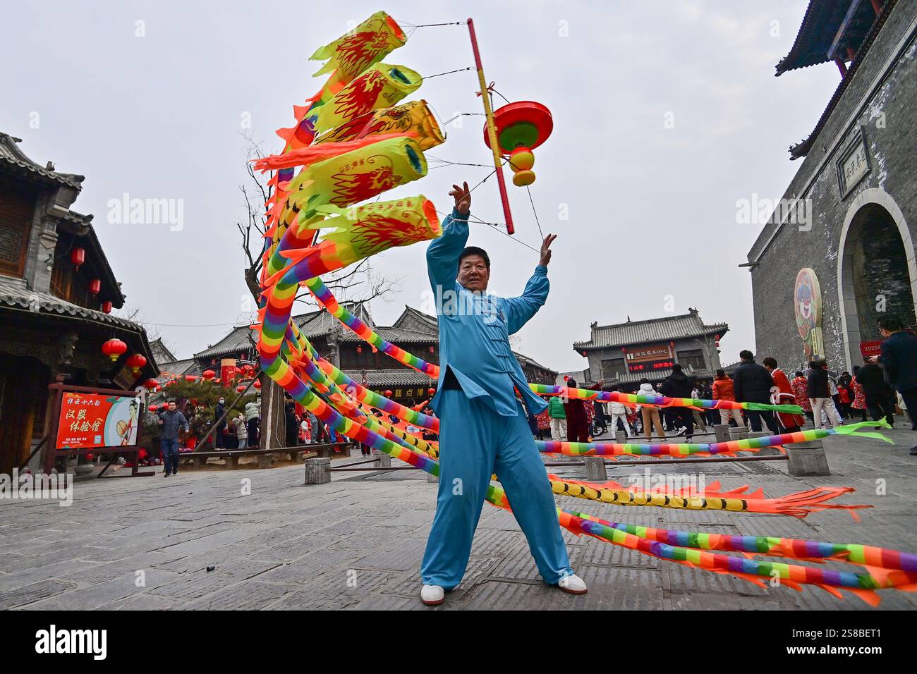 QINGZHOU, CHINA - JANUARY 22, 2025 - A folk artist plays diabolo at the ...