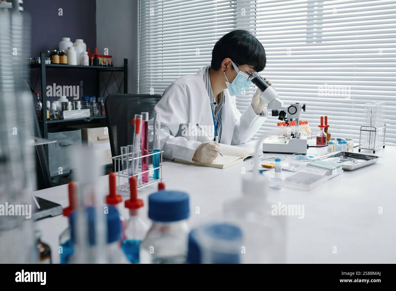 Scientist Conducting Research in Modern Laboratory Setting Stock Photo ...
