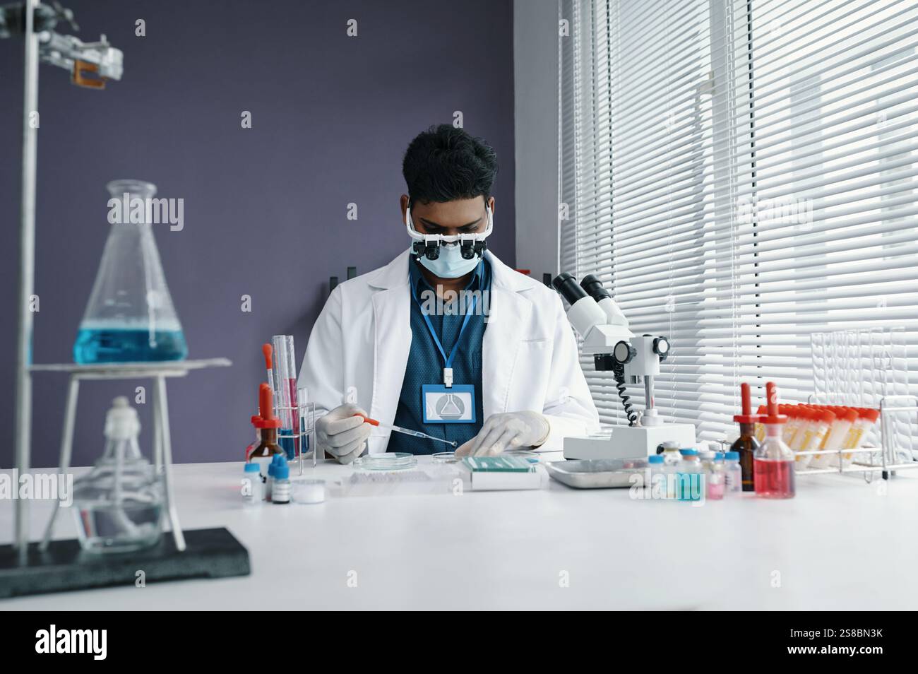 Conducting Scientific Experiments in Modern Laboratory Stock Photo - Alamy