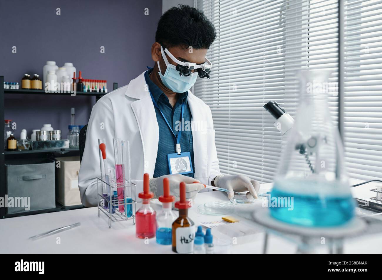 Conducting Chemical Experiment in Modern Laboratory Setting Stock Photo ...