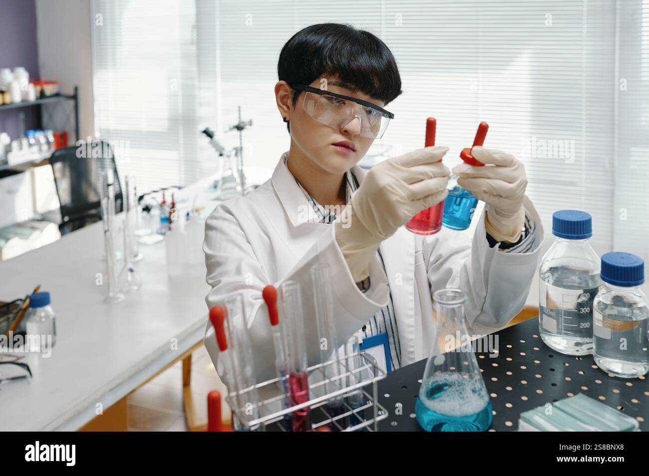 Conducting Scientific Experiment in Modern Laboratory Setting Stock ...