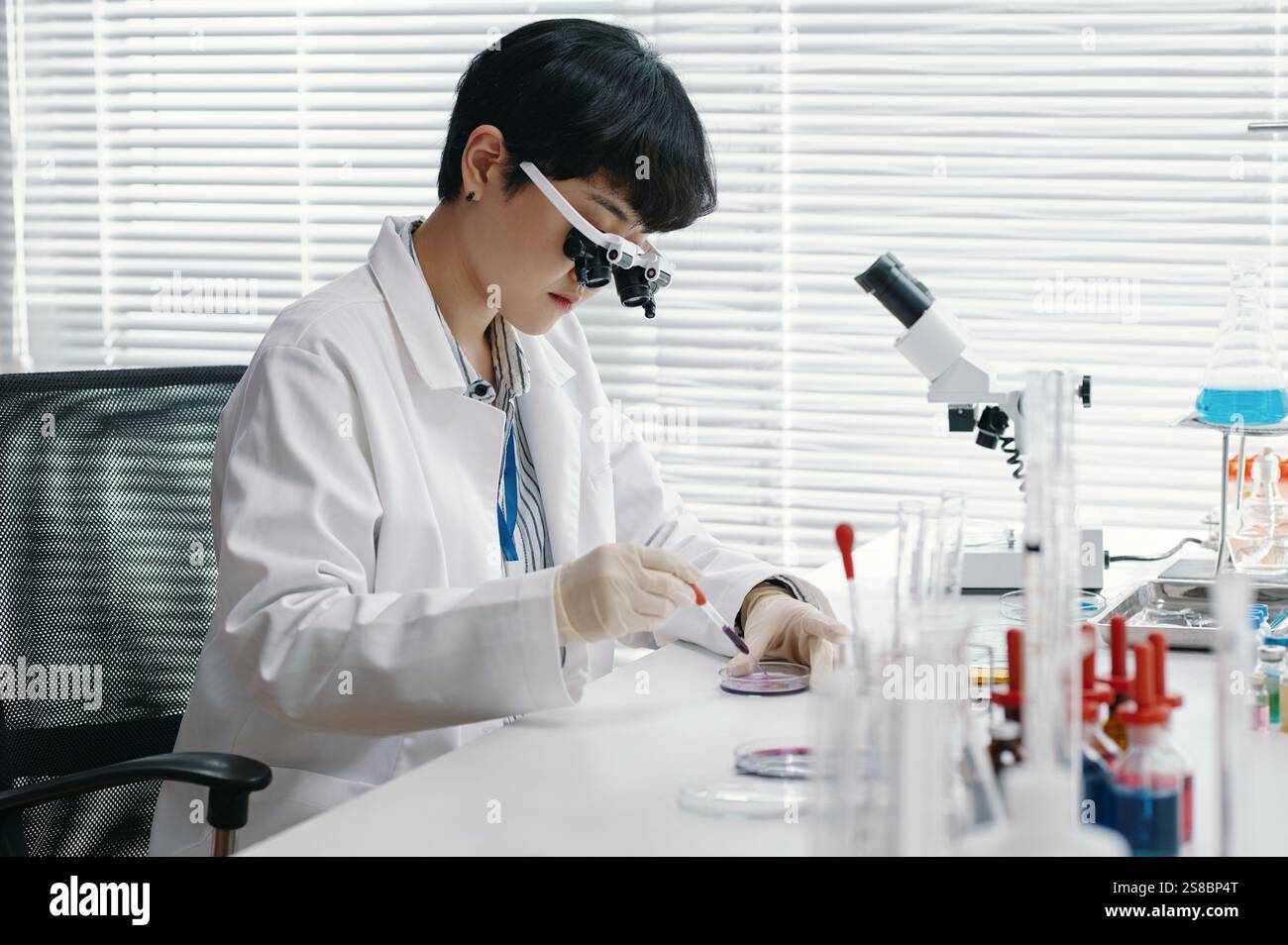 Conducting Scientific Research in Laboratory Setting Stock Photo - Alamy