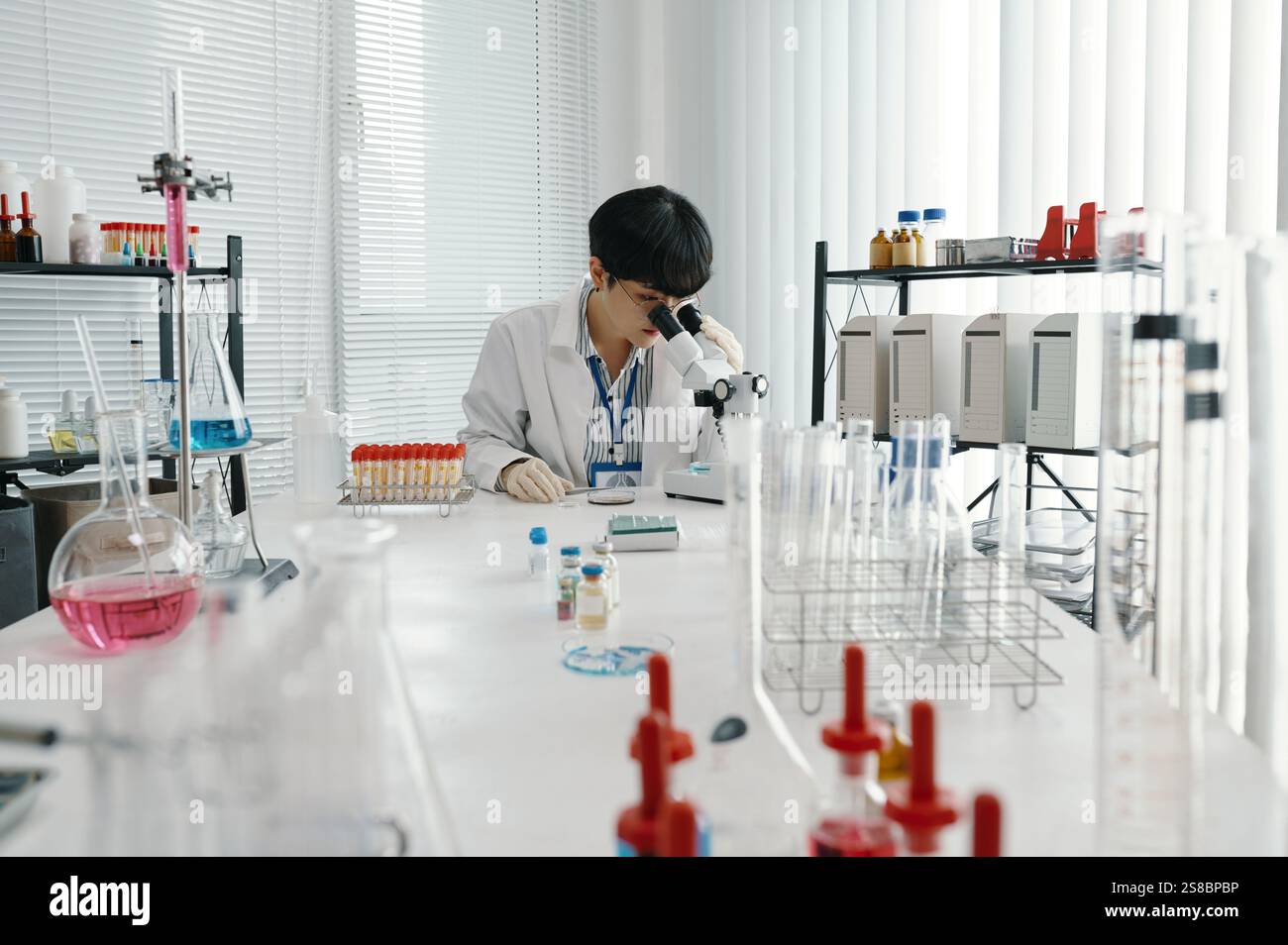 Scientist Conducting Research in Modern Laboratory Stock Photo - Alamy