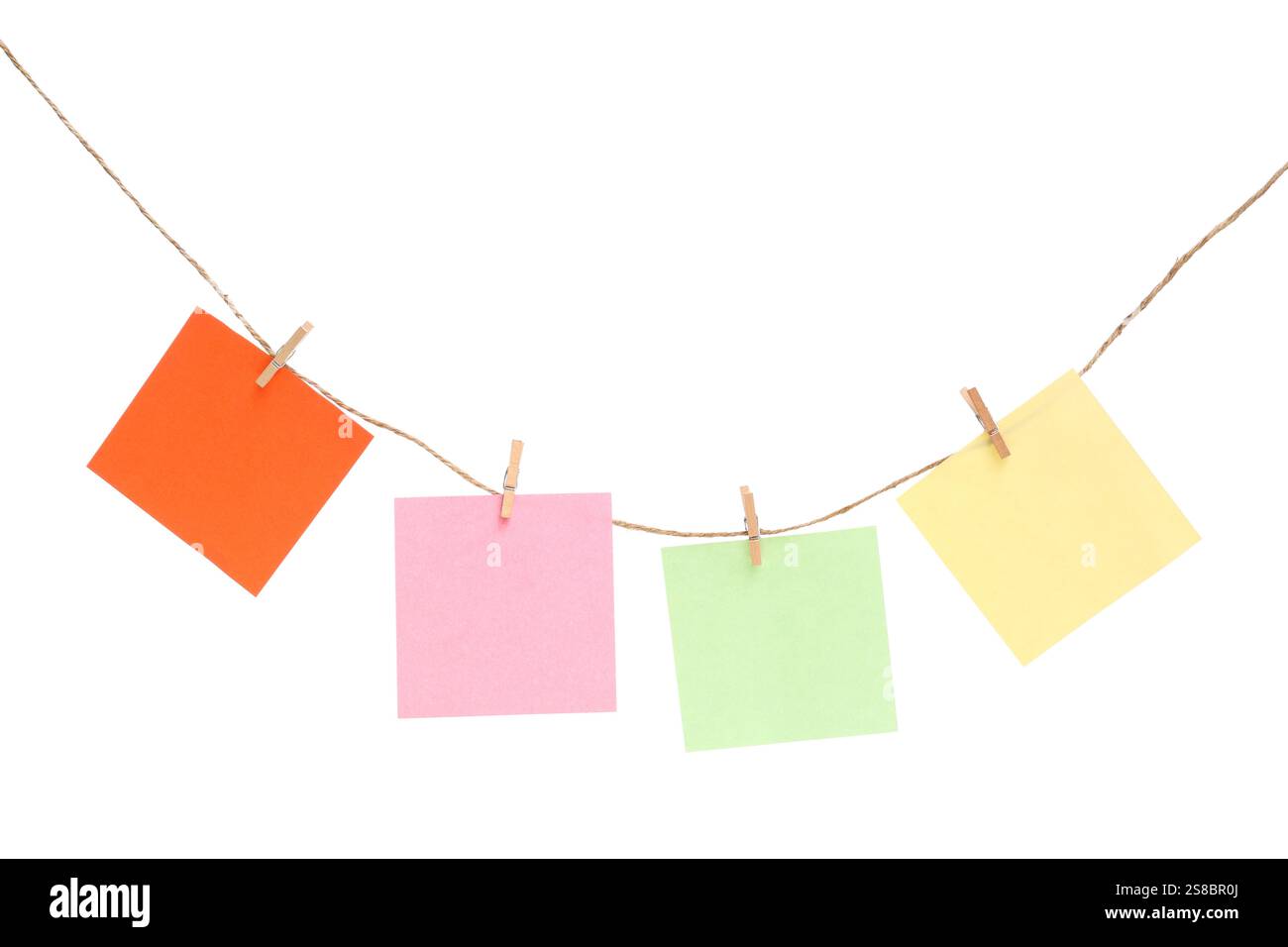 Different sticky notes, thread and clothespins isolated on white ...