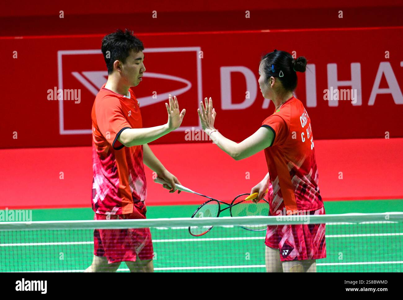 Jakarta, Indonesia. 22nd Jan, 2025. Guo Xinwa (L) /Chen Fanghui celebrate a score during the ...