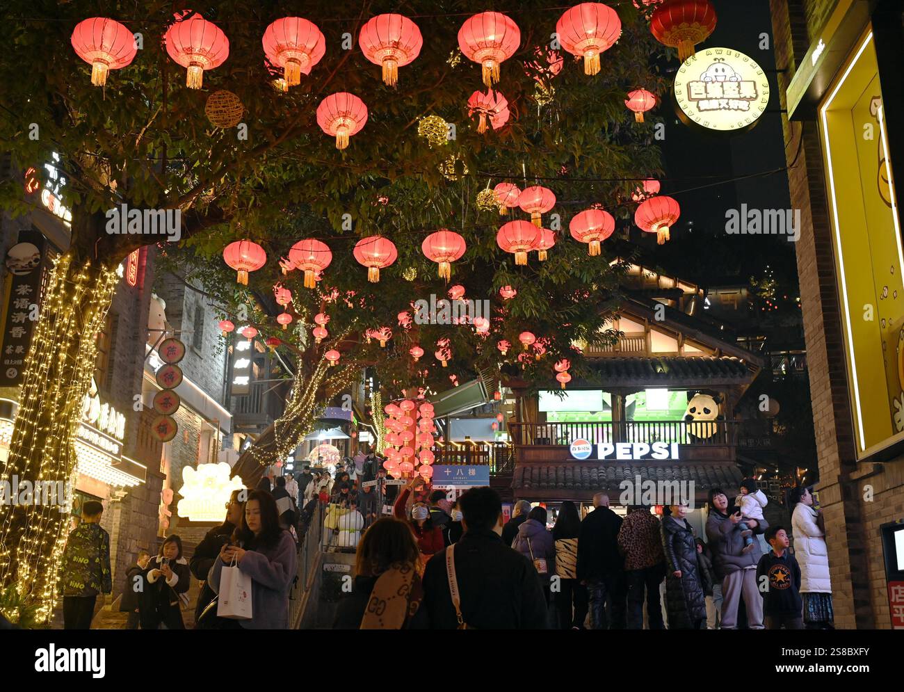 Tourists enjoy night view of Shibati scenic area in Chongqing, China ...