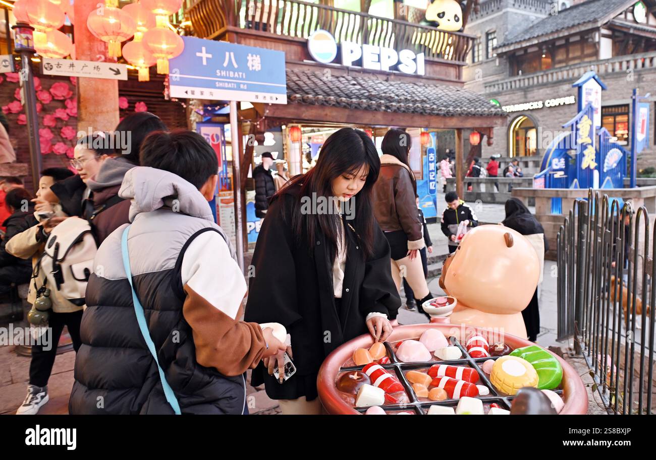 Tourists enjoy night view of Shibati scenic area in Chongqing, China ...