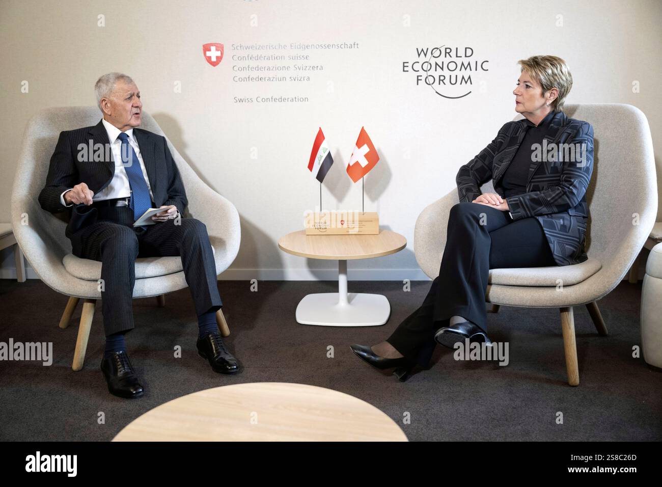 President of Iraq Abdul Latif Rashid, left, speaks with Swiss Federal ...
