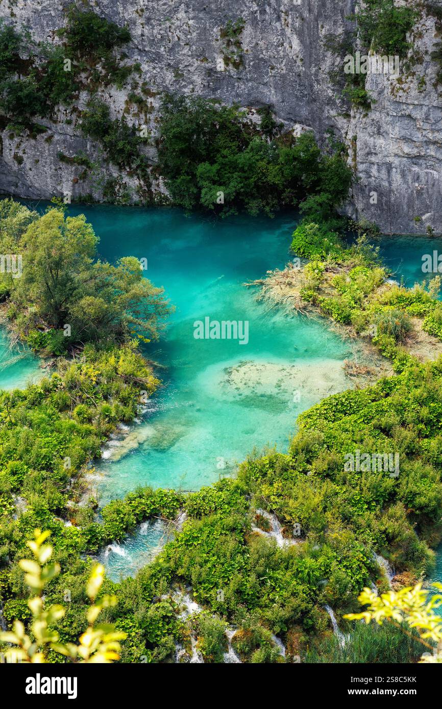 Scenic view Plitvice lakes turquoise waters surrounded by lush greenery ...