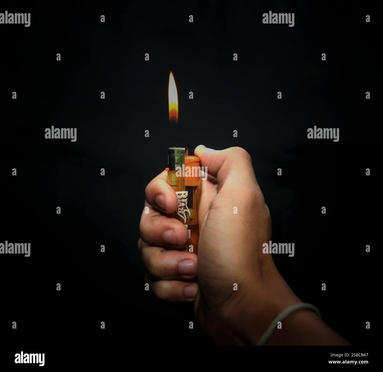 Ignition through the lighter Stock Photo - Alamy