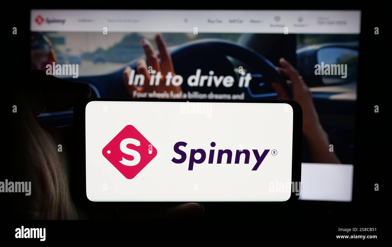 Germany. 22nd Oct, 2024. In this photo illustration, a person is holding a cellphone with the ...