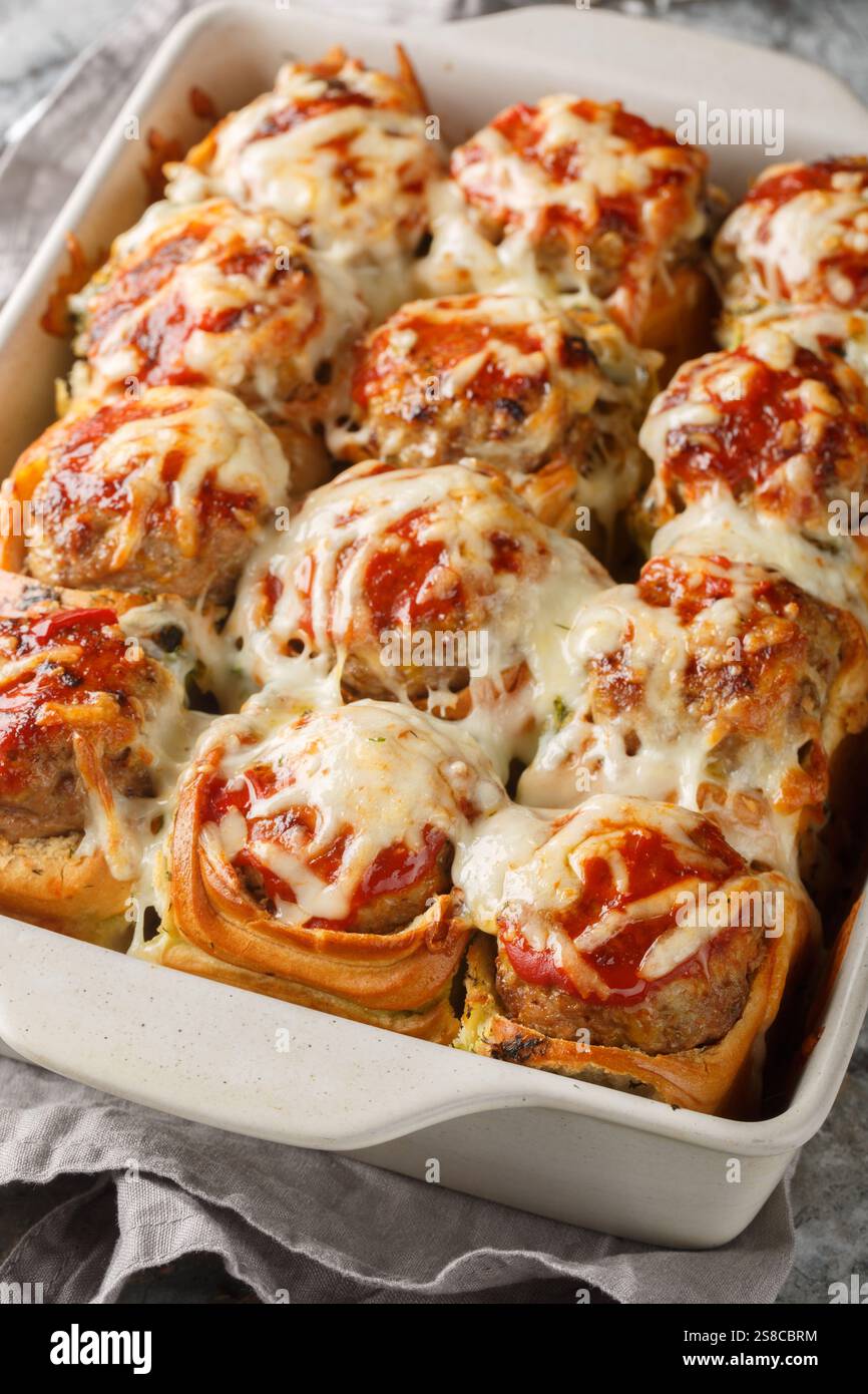 Garlic Bread Meatball Bombs are dinner rolls stuffed with a meatball ...