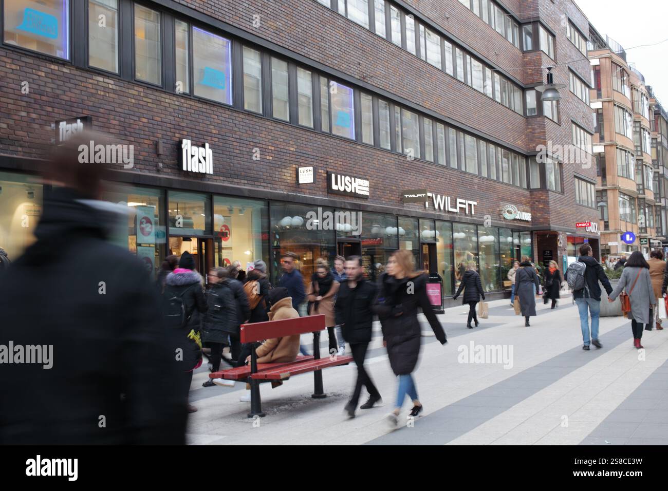 People walking and shopping on Drottningsgatan, the main pedestrian ...