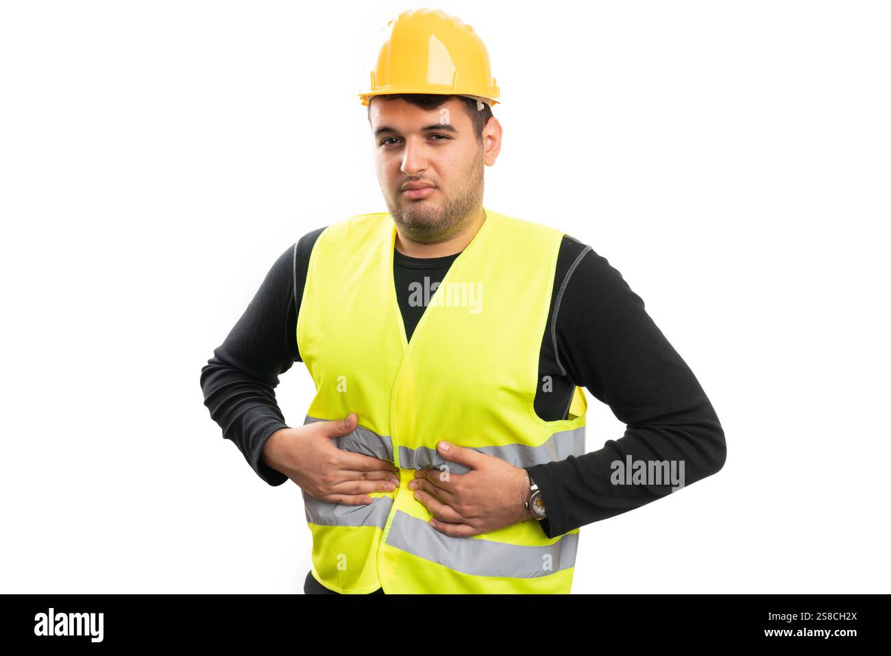 Ill sick construction worker man touching painful abdomen as ...