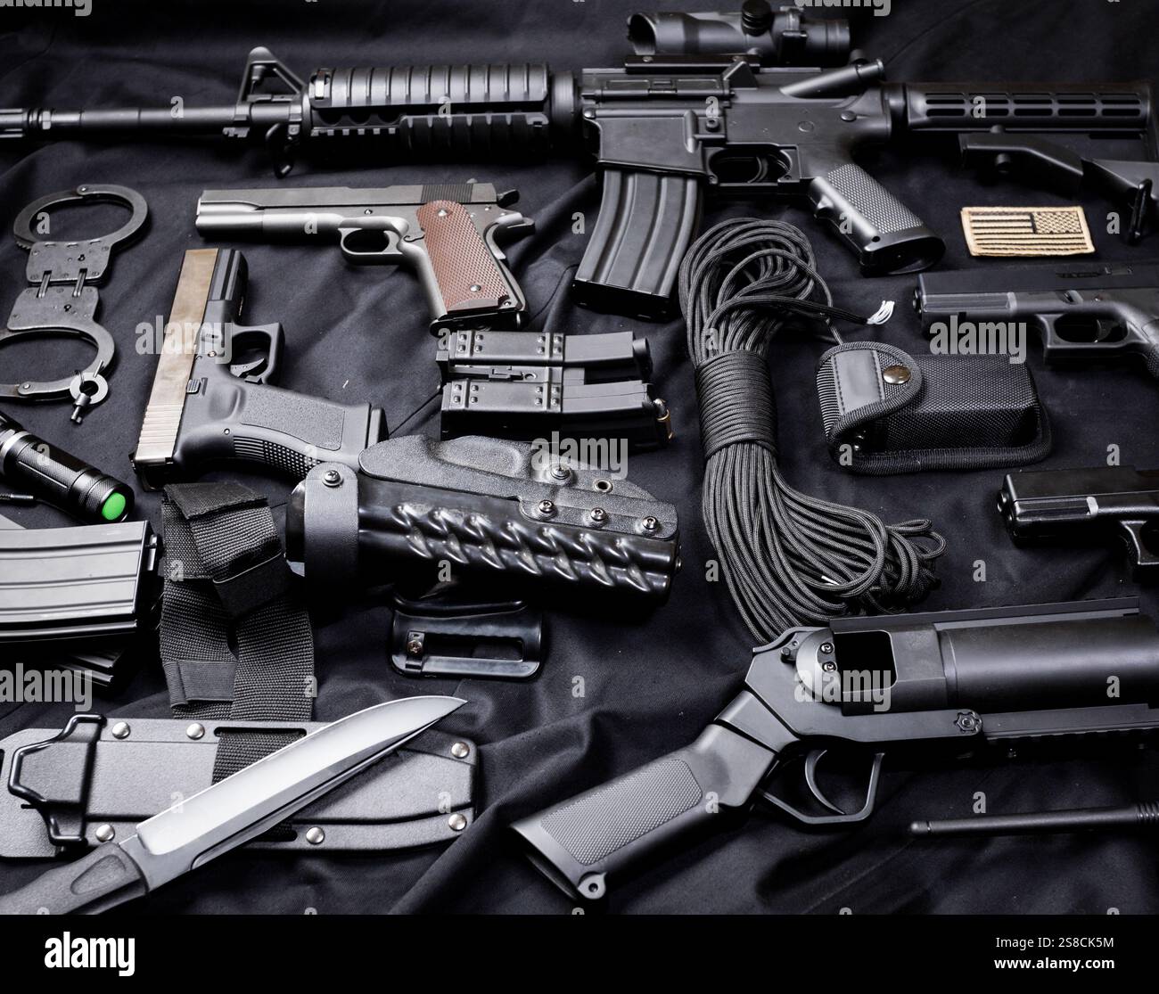 modern weapon, black background Stock Photo - Alamy