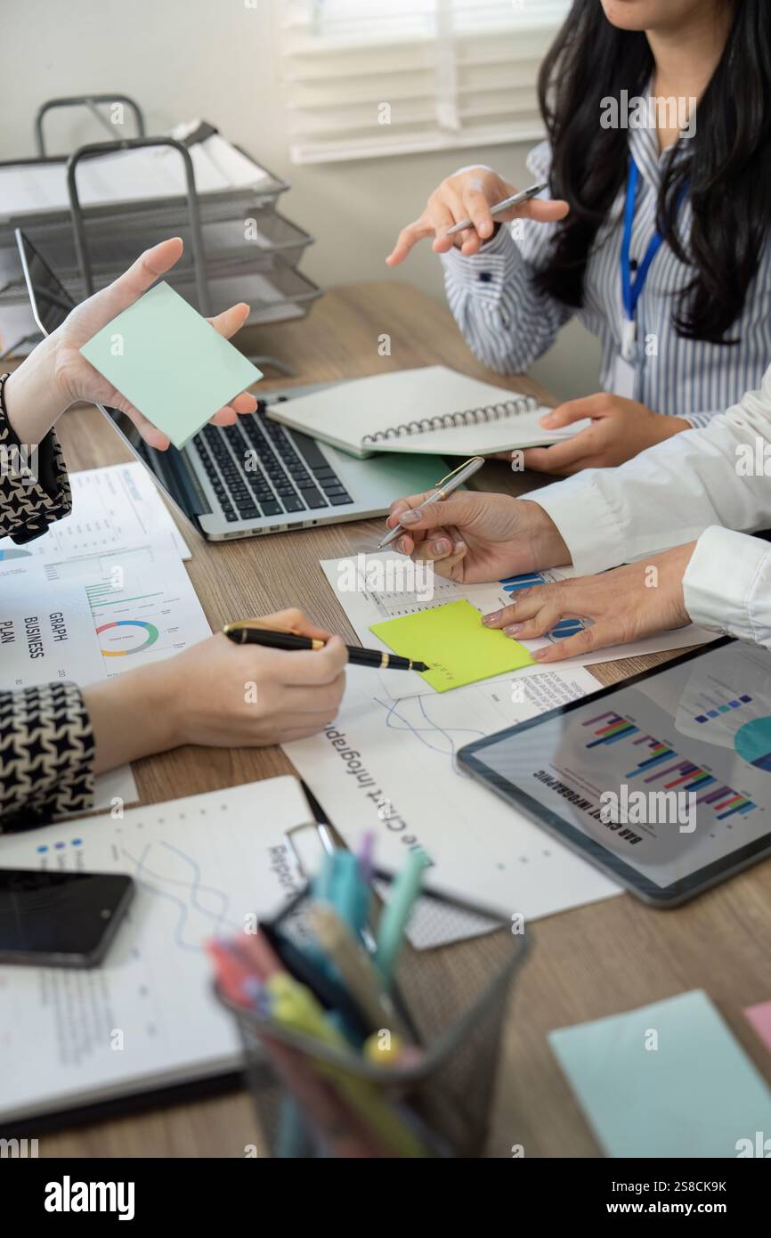 Dynamic team discussing data insights and brainstorming ideas with ...