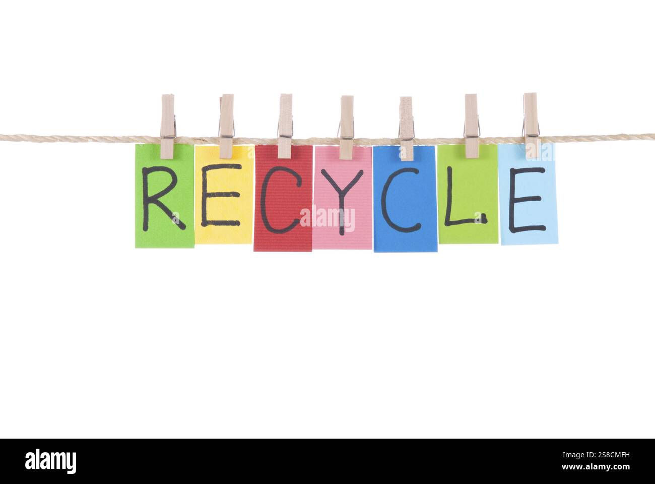 Recycle, paper words card hang by wooden peg Stock Photo - Alamy