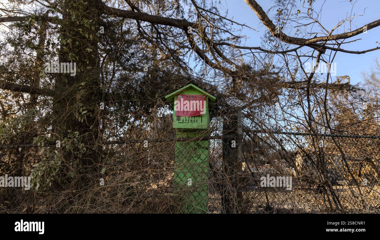 January 21, 2025, Altadena, California, USA: A green mail box with a ...