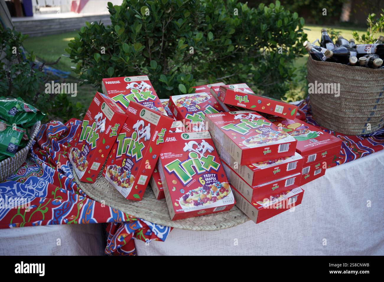 A colorful arrangement of Nestlé Trix cereal boxes on a vibrant ...