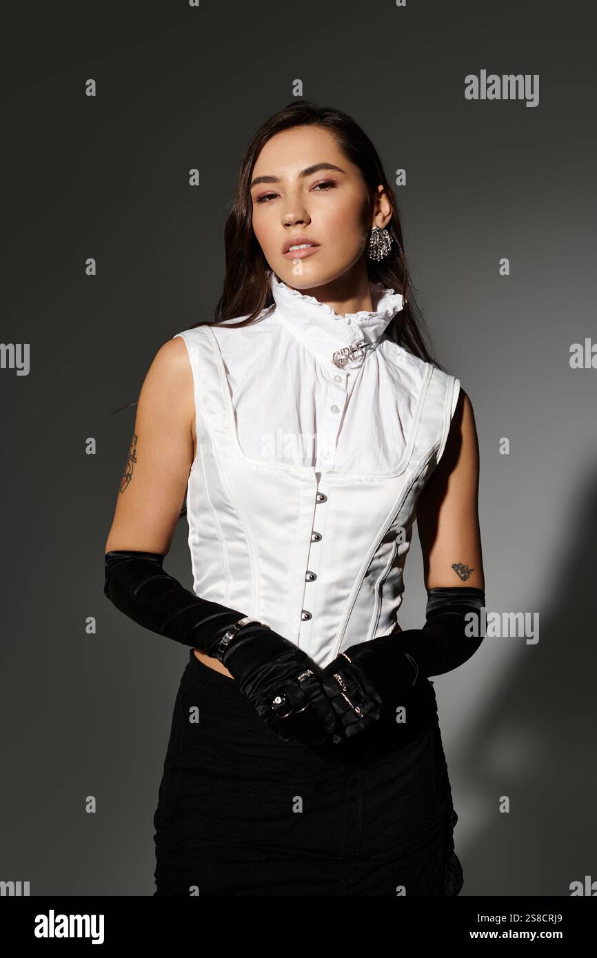 Elegant woman poses stylishly hi-res stock photography and images - Alamy