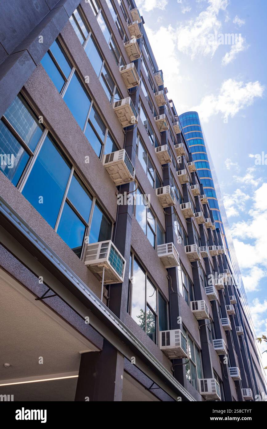 An older style high rise office building with multiple single room ...