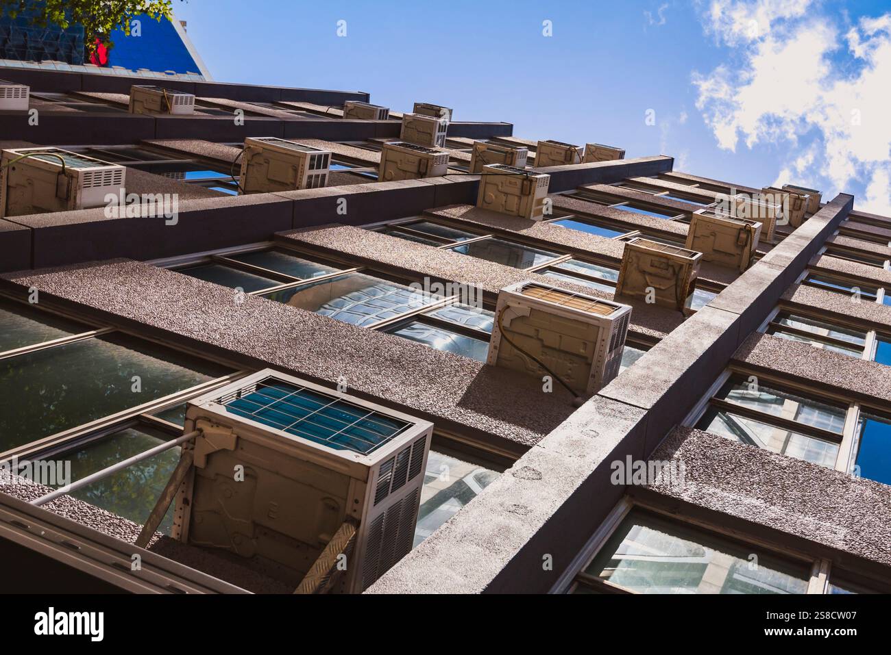 An older style high rise office building with multiple single room ...