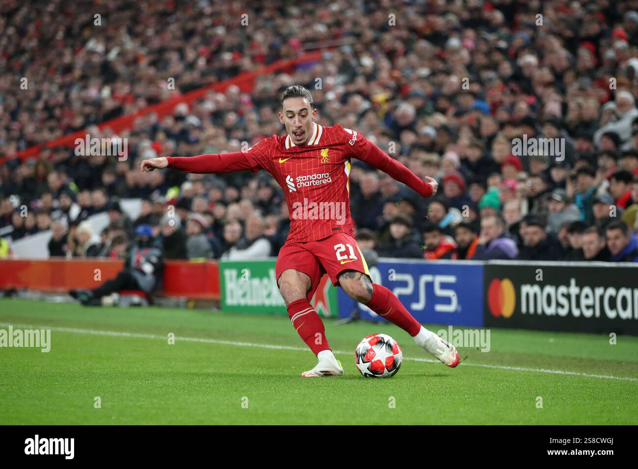 Liverpool, UK. 21st Jan, 2025. Liverpool's Kostas Tsimikas passes the ...