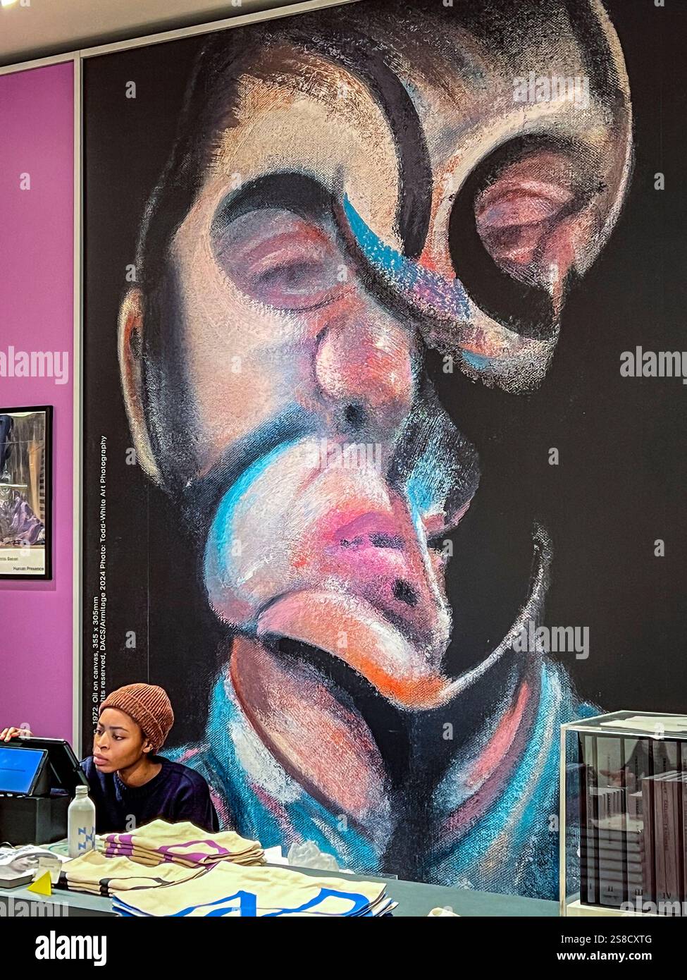 A poster featuring an enlarged self-portrait from 1972 by the artist ...