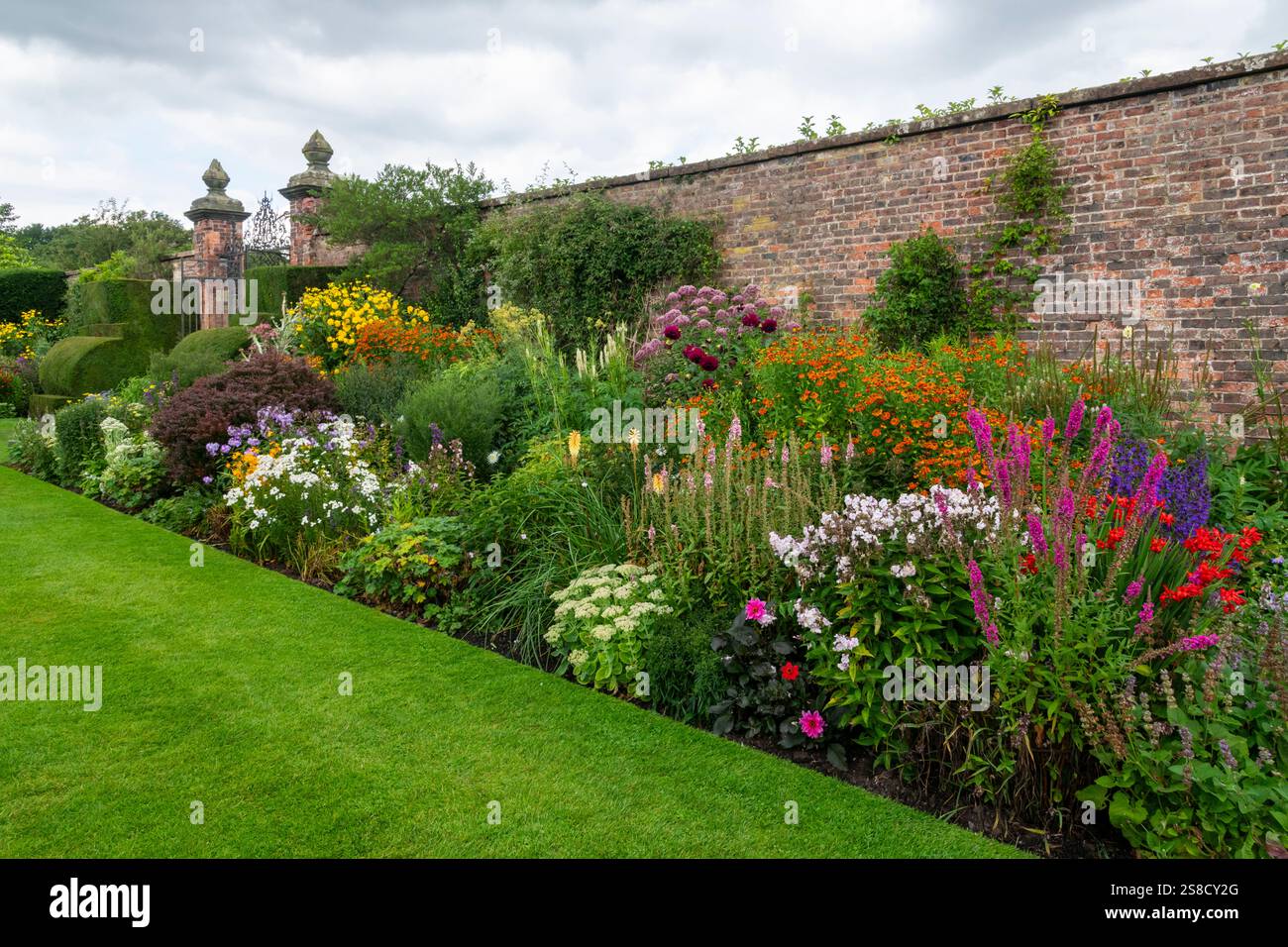 Herbaceous borders at Arley Hall in Cheshire, England. Late summer and ...