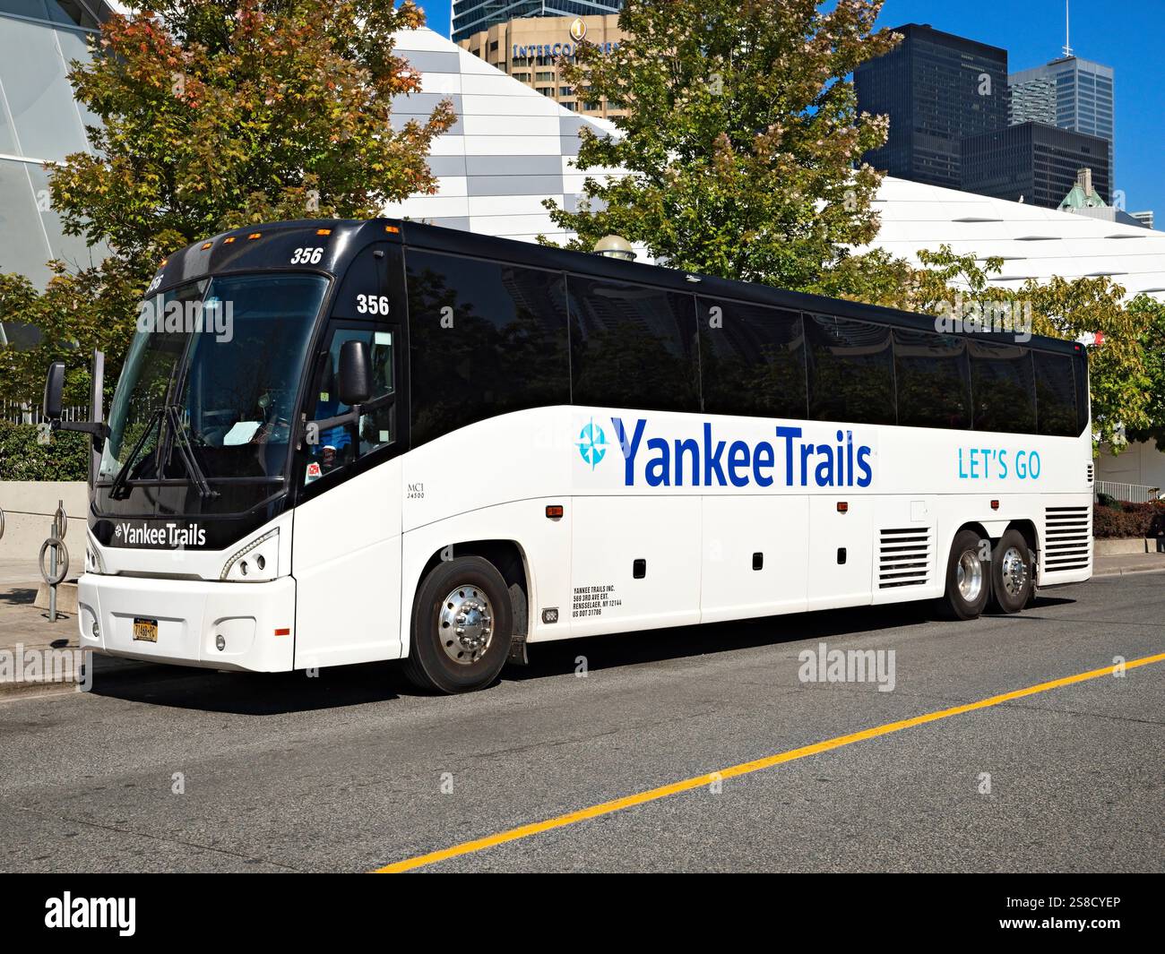 Toronto Canada / A Yankee Trails Tour Bus transports tourists to the CN ...