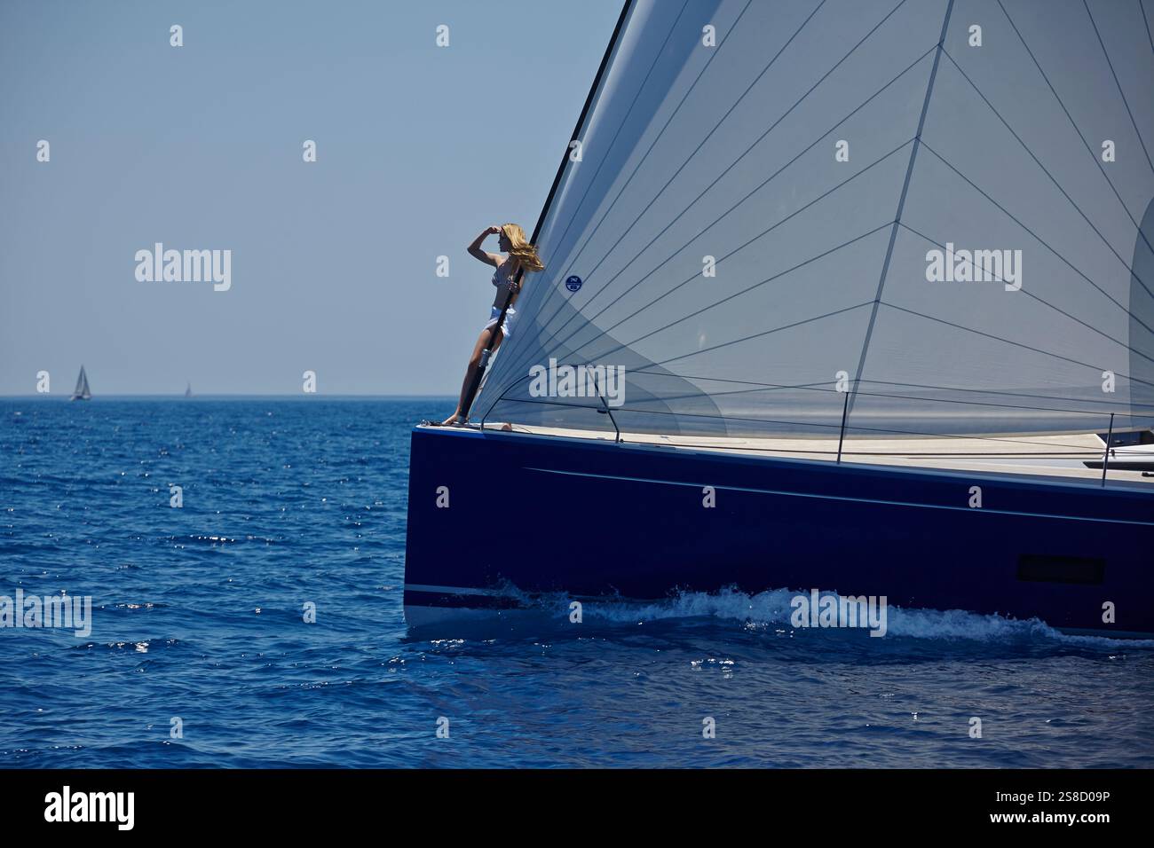Girl Enjoying Sailing on the Bow of a Luxury Yacht at Sea Stock Photo ...