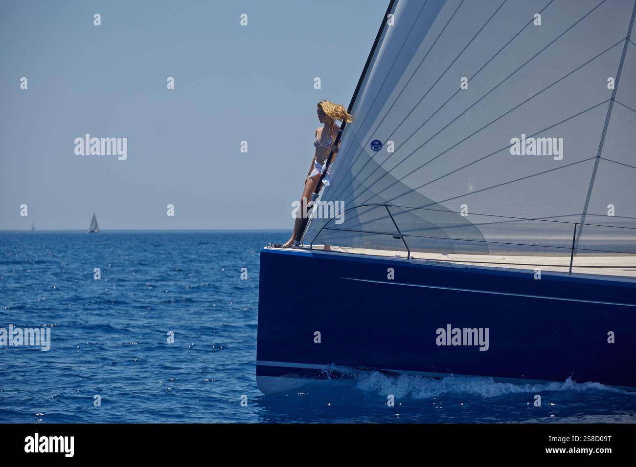 Girl Enjoying Sailing on the Bow of a Luxury Yacht at Sea Stock Photo ...