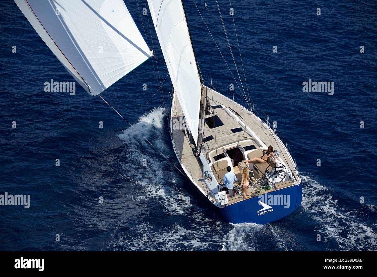 Aerial view of Sailing Yacht Gliding on Open Blue Sea with Relaxing ...