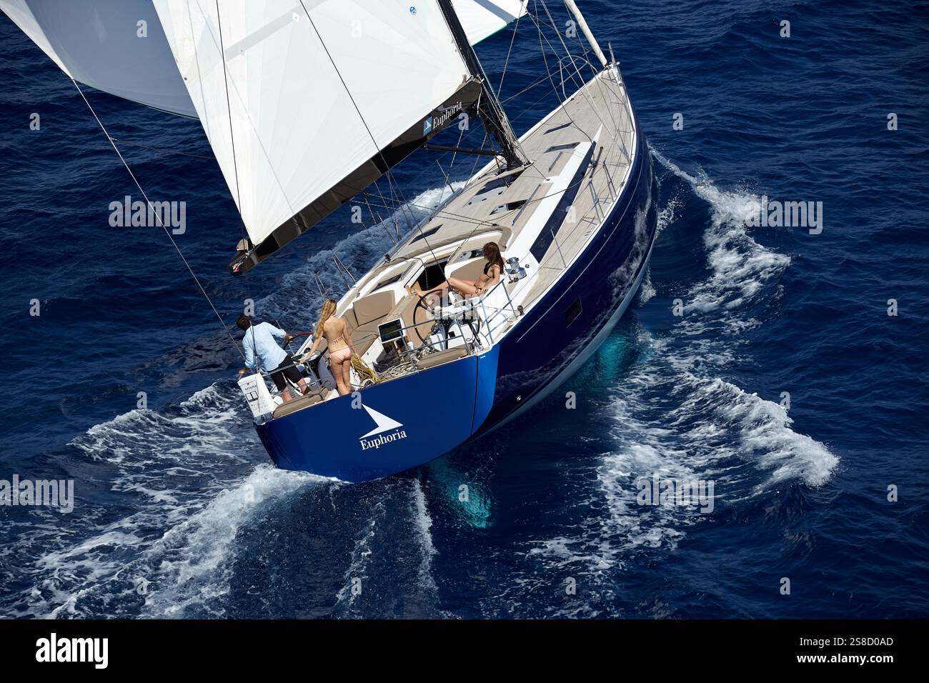 Aerial view of Sailing Yacht Gliding on Open Blue Sea with Relaxing ...